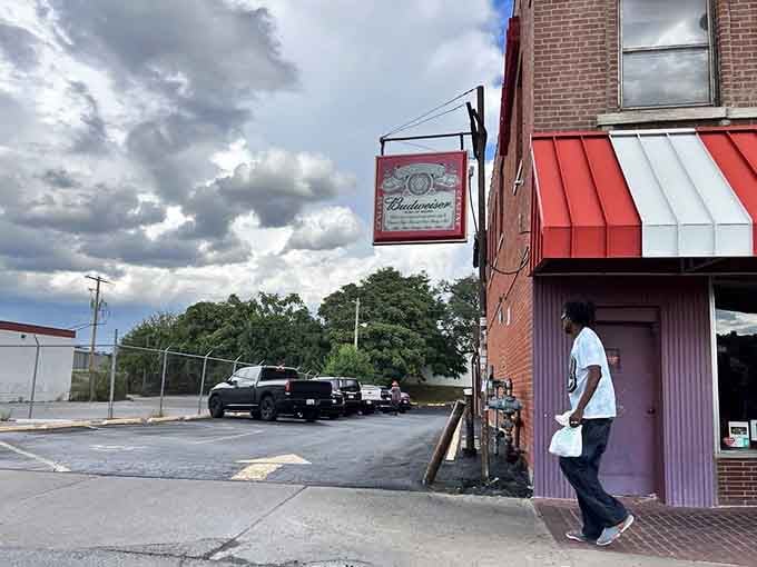 The parking lot won't win beauty contests, but the cars here belong to people who understand what really matters.