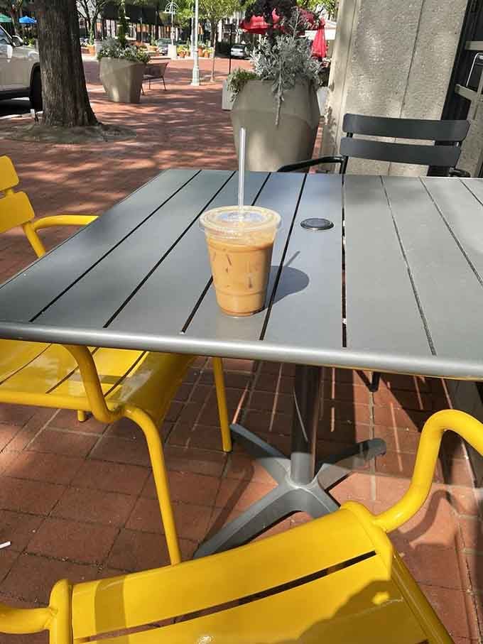 Bright yellow chairs beckoning you to sit, relax, and enjoy Arlington's streetscape while savoring every sweet bite.