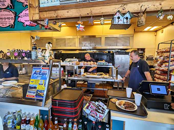 Behind the counter, the magic happens where patience, smoke, and expertise transform meat into Minnesota barbecue legend.