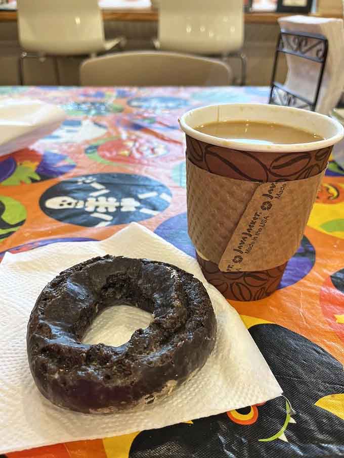 Double chocolate donut and coffee: the breakfast of champions, or at least people who've given up pretending kale is satisfying.