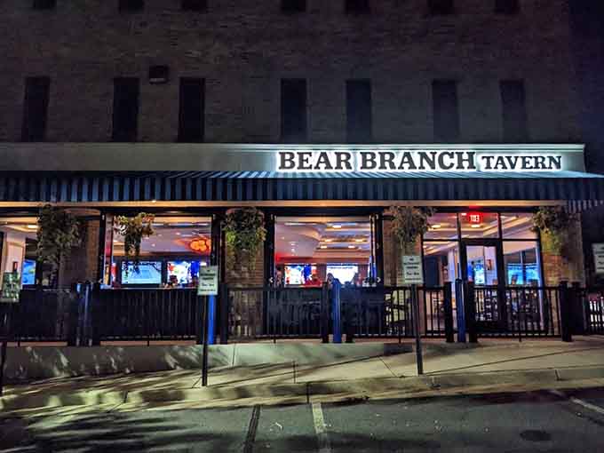 Evening lights transform the tavern into a glowing invitation you simply cannot refuse to accept tonight.