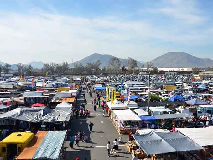 This aerial view reveals the true scale of bargain hunting paradise, stretching endlessly beneath that perfect California blue sky.