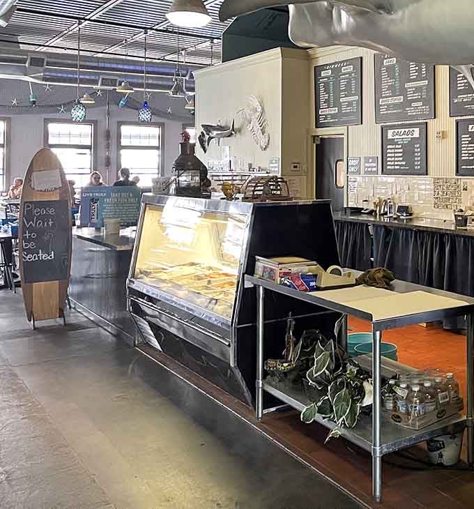 The ordering counter where your seafood adventure begins, complete with display cases showing off the day's freshest catches and offerings.