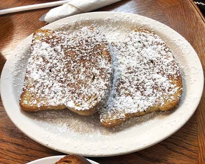 French toast dusted with powdered sugar like fresh snow on the most delicious winter morning ever.