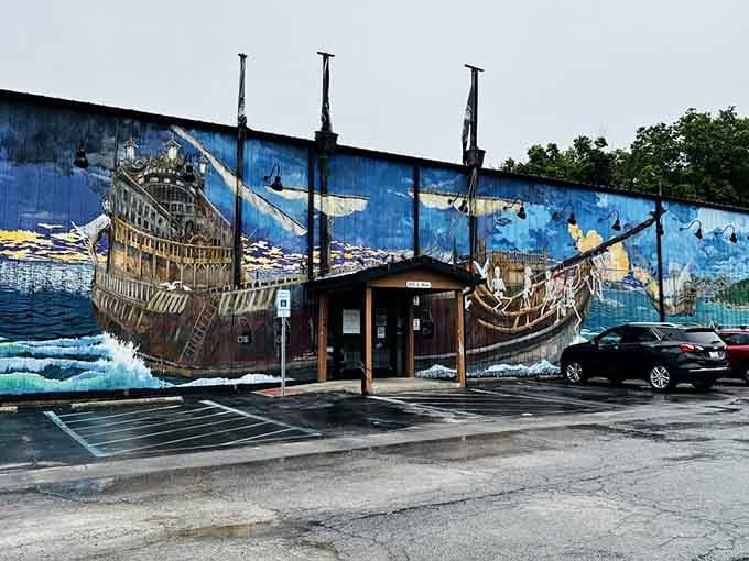 That pirate ship mural wrapping the building promises adventure, and the food inside absolutely delivers on it.