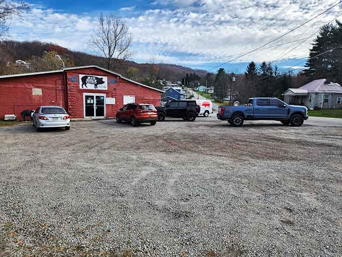 Full parking lot against rolling hills signals that locals know something special, and now you're about to discover it too.