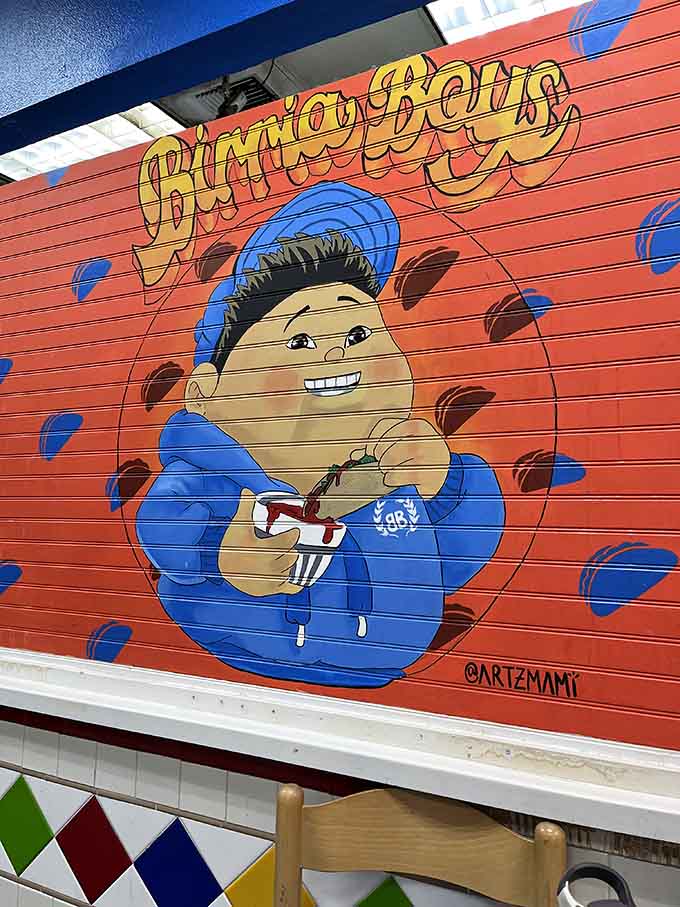That smiling mascot on the mural perfectly captures the joy you'll feel after eating here, birria bowl in hand.