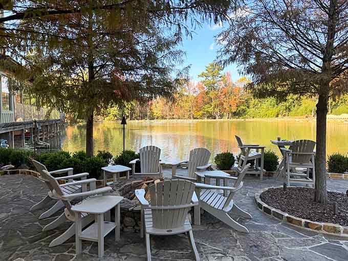 Adirondack chairs face the peaceful lake, offering the perfect spot to digest your meal while contemplating life's simple pleasures.
