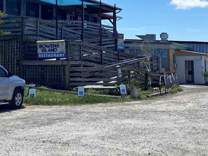 The gravel parking lot and weathered exterior are your first clue that you've found something real in a world of manufactured experiences.