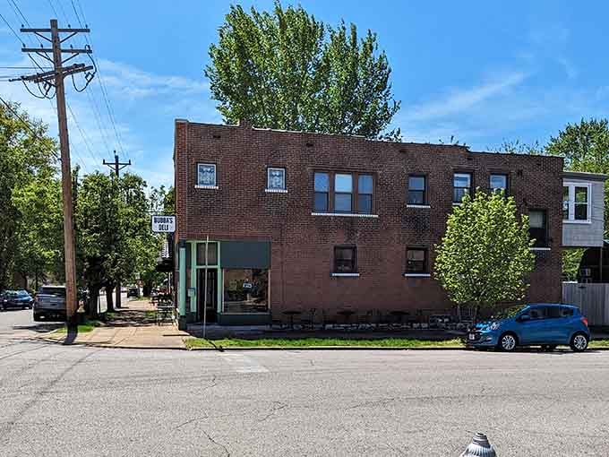 The brick building blends into the neighborhood like it's always belonged right there.