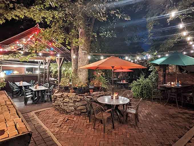 Twinkling lights transform this outdoor patio into the kind of magical space where summer evenings last forever.