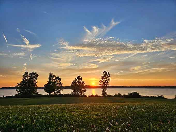 Sunsets at Buck Creek that paint the sky in colors no camera can truly capture, only memories.