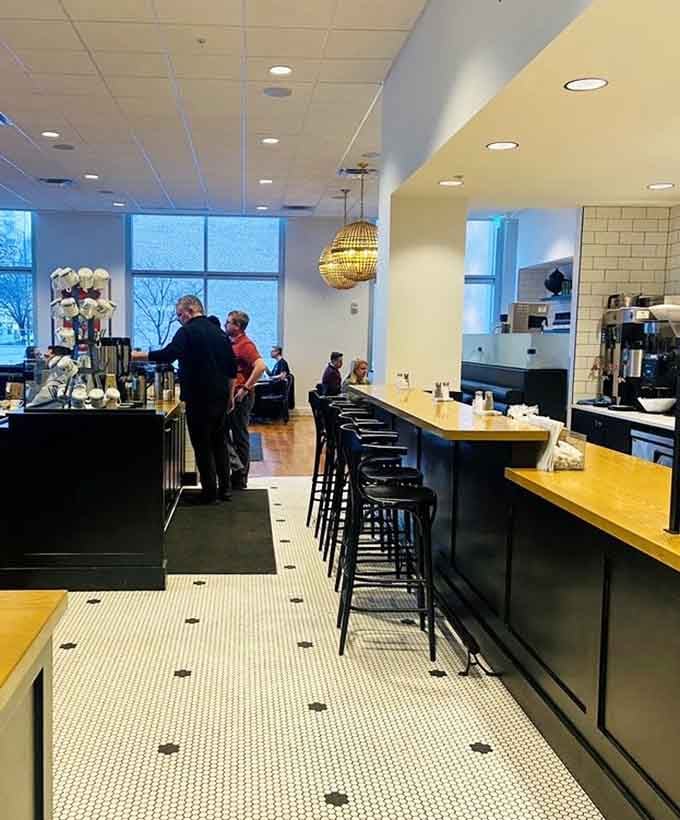 Counter seating offers front-row views of the culinary action, where breakfast theater unfolds with every perfectly plated dish.