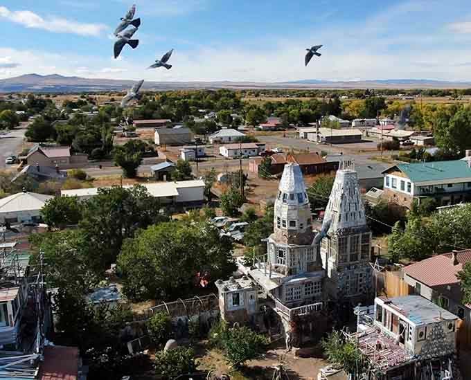 From above, the towers rise like sentinels over Antonito, visible proof that one person's vision can transform everything.