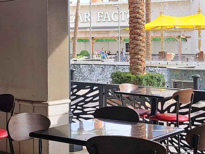 Outdoor seating with fountain views for when you need fresh air between your epic Mortal Kombat battles.