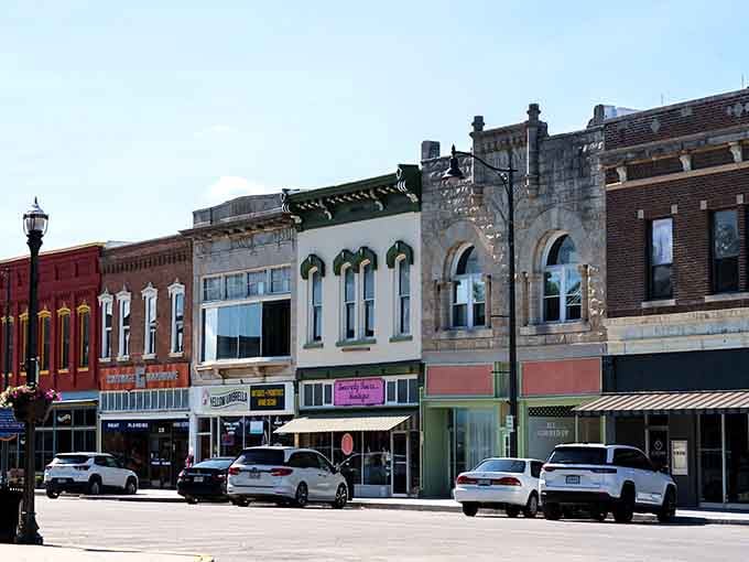 Downtown Carthage's historic storefronts line up like a perfectly preserved postcard from America's Main Street heyday.