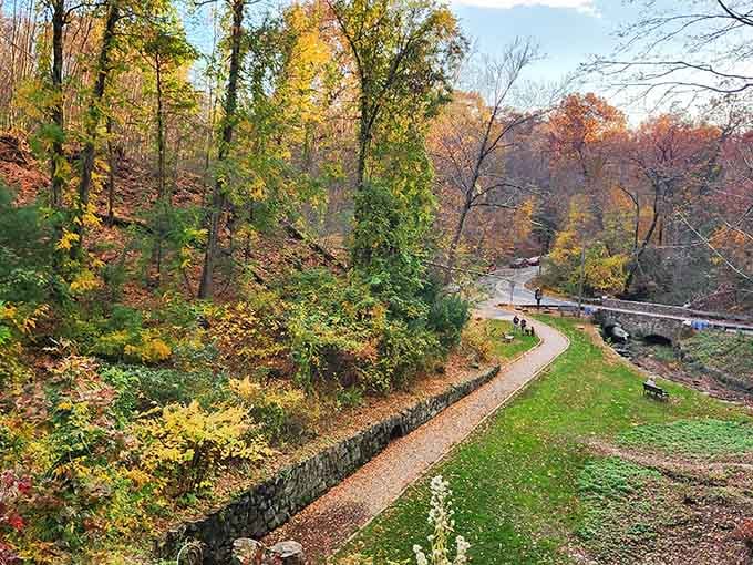 Fall foliage paints the trail in every warm hue imaginable, making every step feel like walking through art.