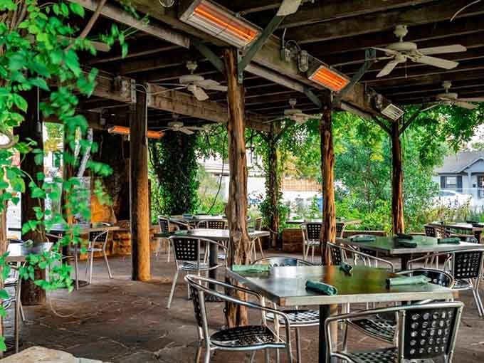 The patio where you can enjoy your meal surrounded by greenery and fresh air, weather permitting of course.