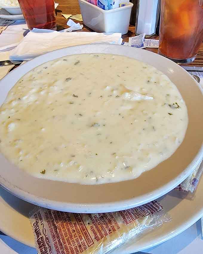 That bowl of lemon orzo soup looks like liquid comfort decided to take a warm, creamy vacation.