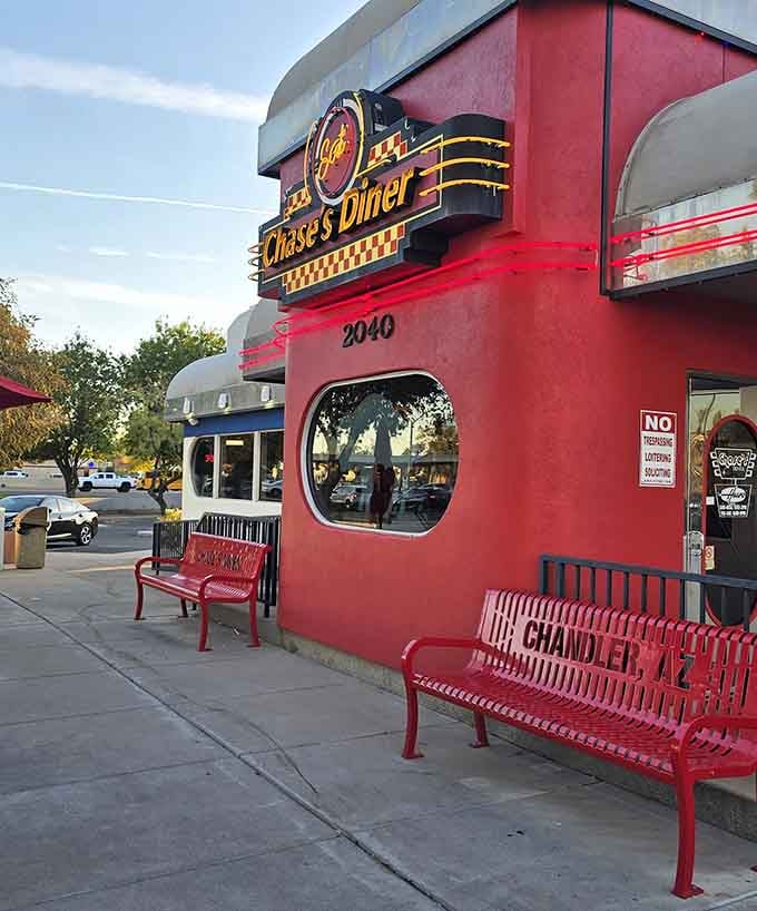 Even the outdoor benches are painted in cheerful red, welcoming you before you even step through the door.