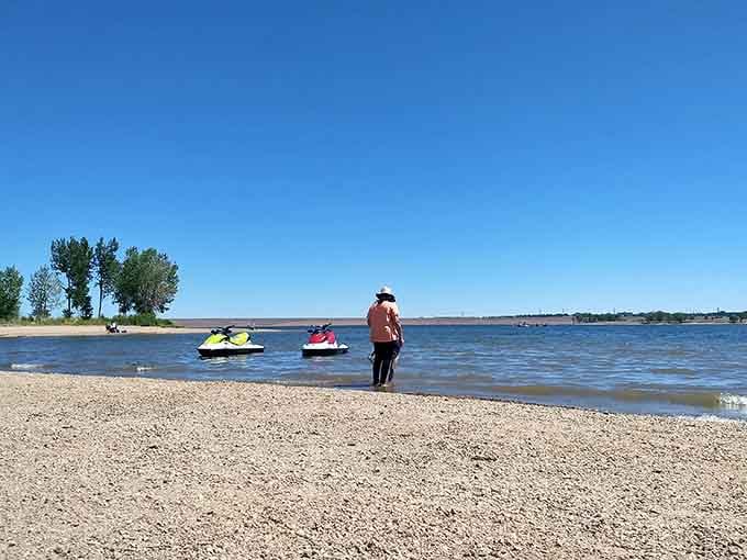 The beach welcomes jet skis and water lovers to a reservoir playground that never charges admission.