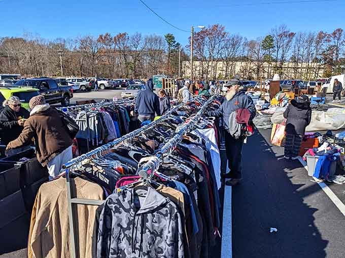 Outdoor clothing racks overflow with options, turning bargain shopping into a full-contact sport experience.