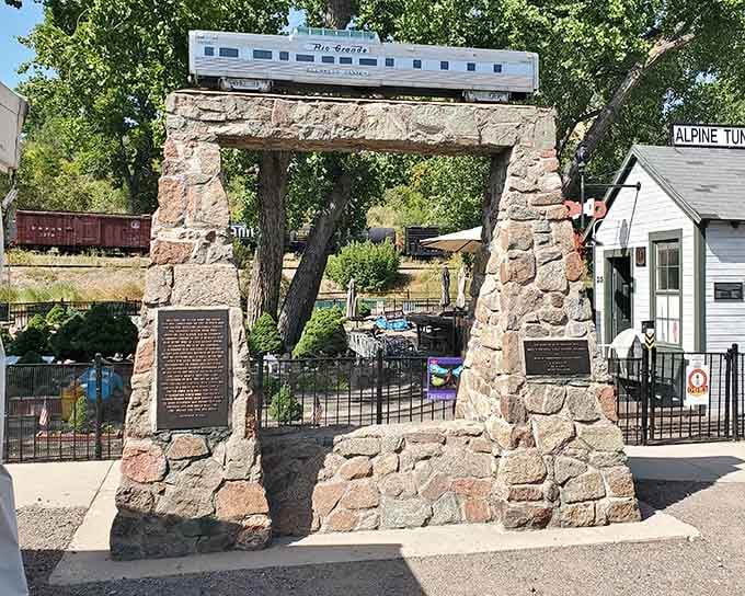 That stone monument isn't just decorative; it's a portal to Colorado's iron horse heritage standing proud.