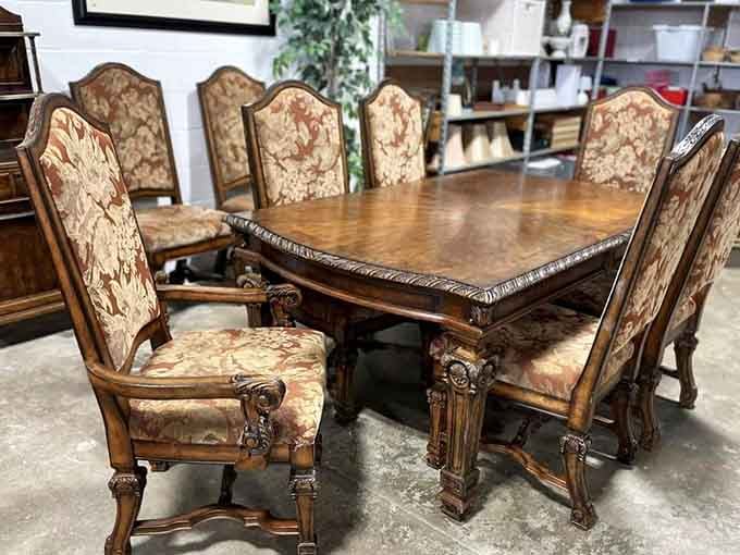 This ornate dining set looks like it belongs in a castle, not a thrift store with prices mere mortals can afford.