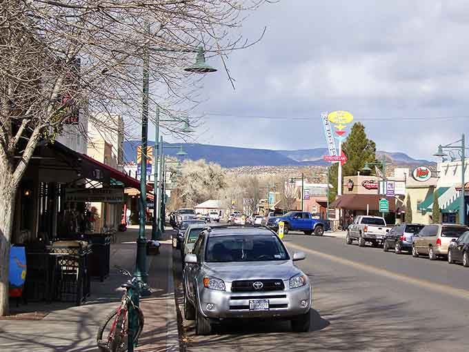 Main Street beckons with that perfect small-town vibe where every shop window promises another potential discovery waiting inside.