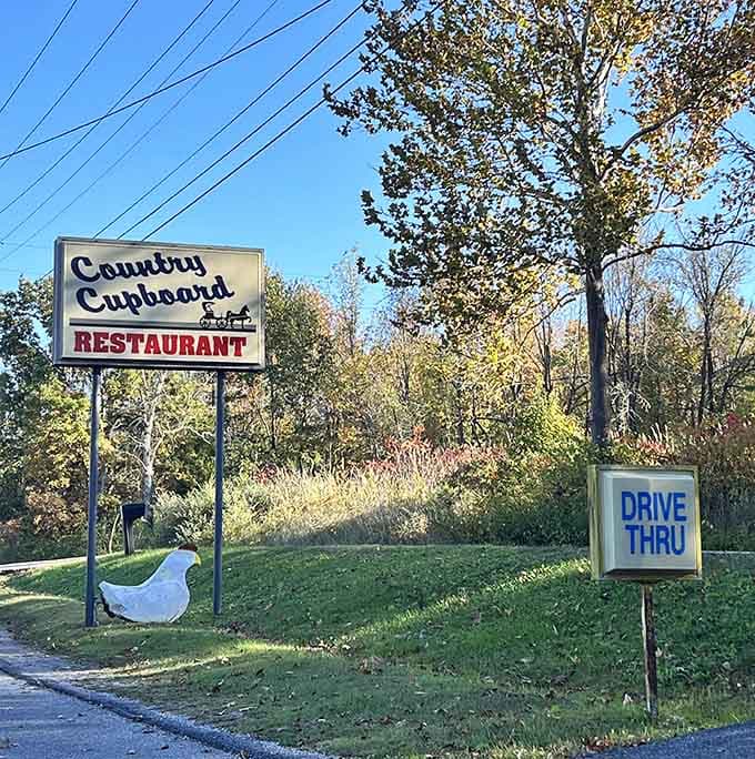 That classic roadside sign promising good food and even better value, visible from the highway like a beacon.