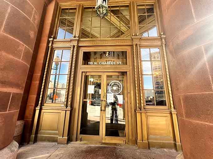 Those golden doors welcome you into a breakfast experience that transcends the ordinary cafe visit.