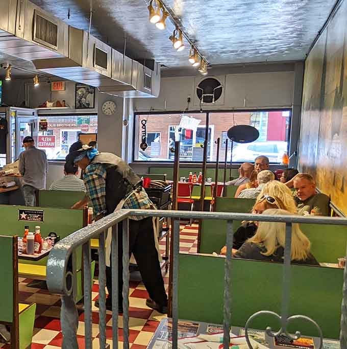 Another angle of this cozy space where strangers become friends over shared appreciation for exceptional breakfast food.