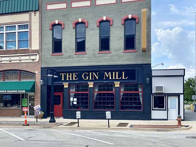 The Gin Mill's vintage storefront whispers tales of Decatur nights past, present, and deliciously future-bound.
