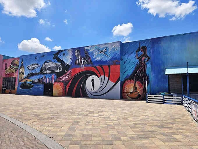 The exterior mural celebrates pop culture icons from Bond to sci-fi, promising nostalgia around every corner inside.