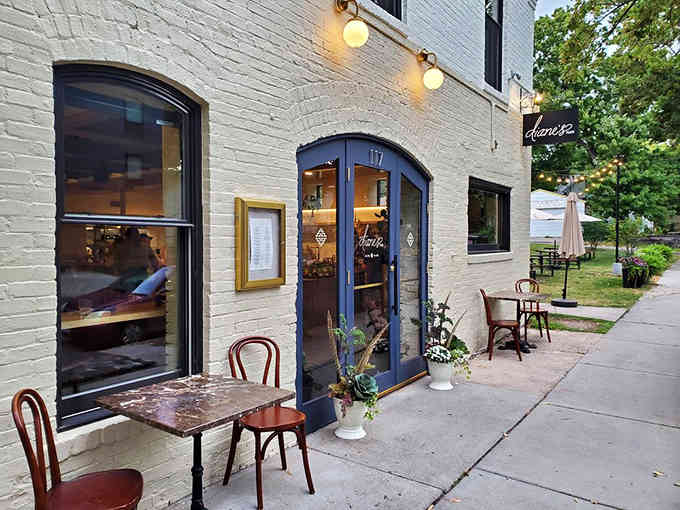 Arched windows and bistro tables outside invite passersby to stop, sit, and discover what the buzz is about.