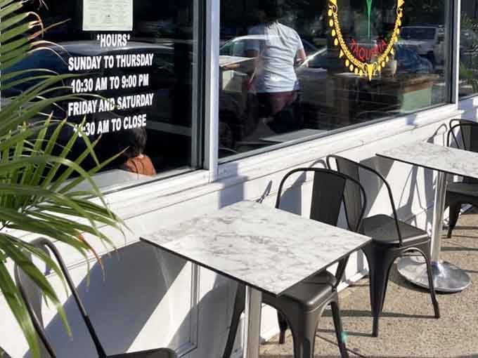 Even outdoor seating beckons when the weather cooperates, offering front-row seats to Milford's best-kept culinary secret in action.