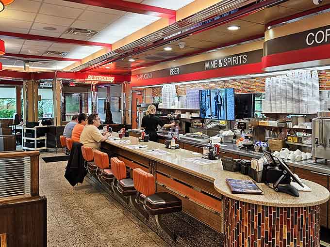 The counter seats offer front-row viewing to the culinary theater where breakfast dreams become delicious reality every single day.