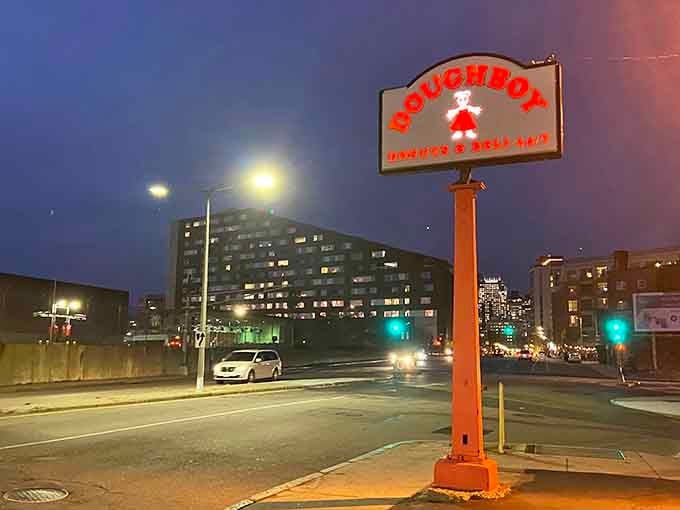 That vintage sign standing tall and proud, a beacon calling all donut lovers home to paradise.
