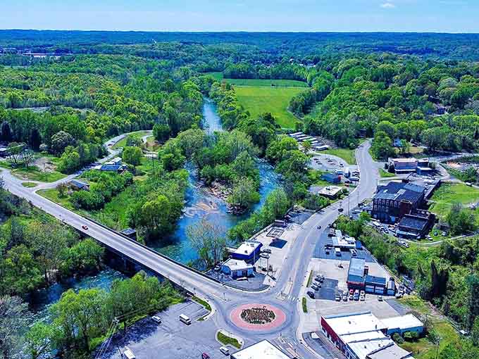 Aerial views reveal a town nestled in greenery, proving that not everywhere paved over nature for parking lots.