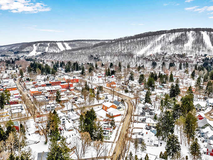 Winter blankets the entire village in white, revealing why this tiny town punches above its weight in outdoor adventures.