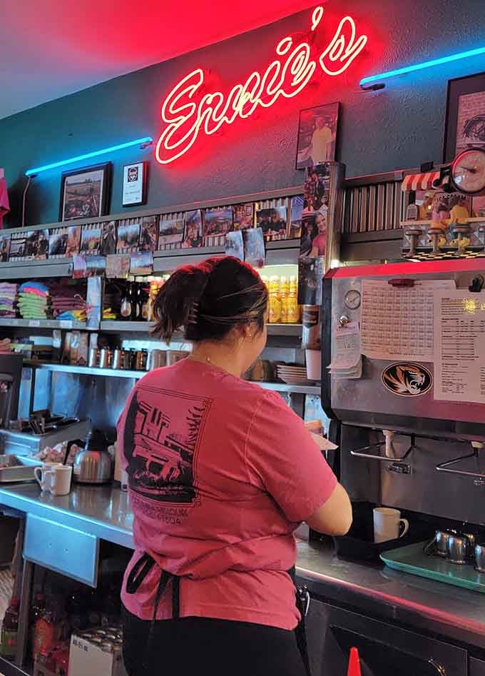 Behind that neon sign, dedicated staff keep the diner tradition alive, one perfectly cooked breakfast at a time.