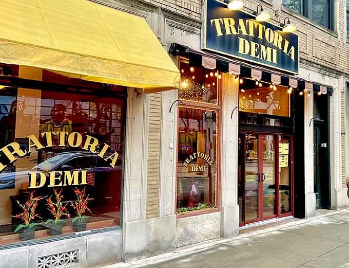 Trattoria Demi's cheerful awning beckons hungry souls seeking authentic Italian flavors without boarding a plane.
