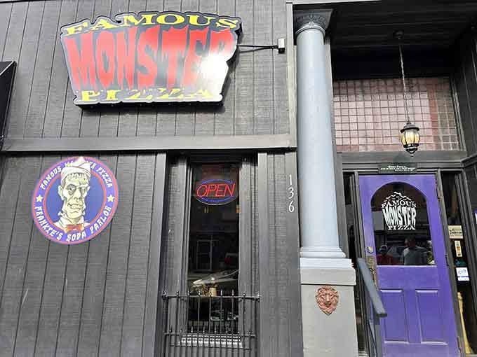 That bold signage and purple door combination makes this spot impossible to miss on any downtown stroll.