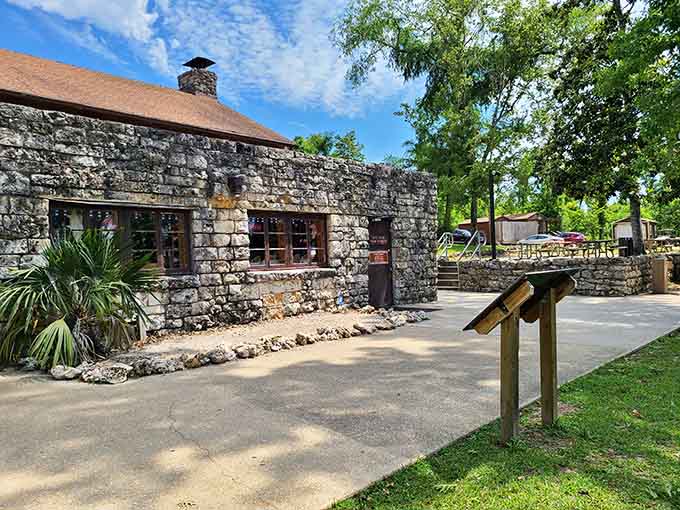 The visitor center's limestone construction matches the caves below—even the buildings get the geological theme right.