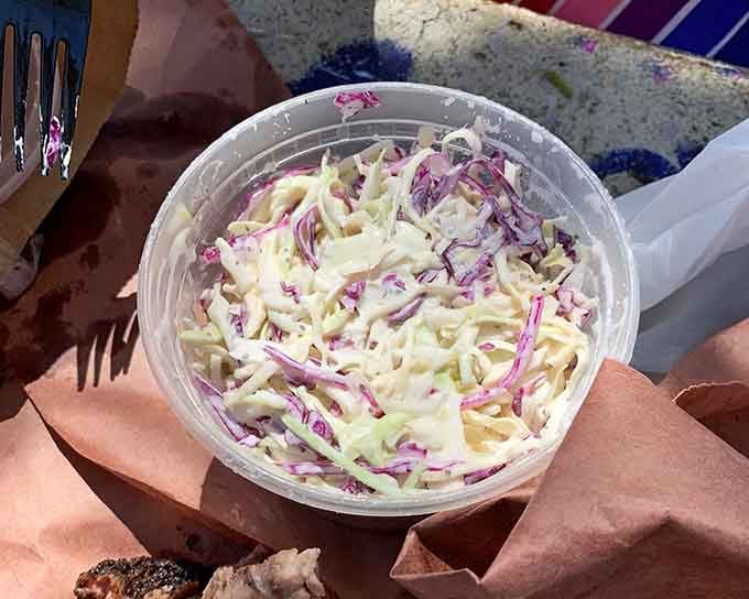Fresh coleslaw providing that crucial crunch and tang to balance all that rich, smoky, absolutely perfect meat.