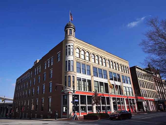 The cupola-topped corner building stands proud on the street, a downtown landmark where past and present shake hands.