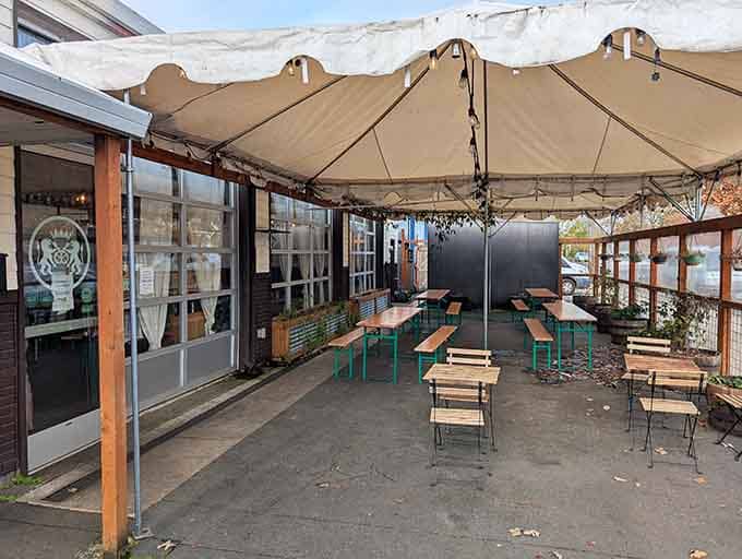 The covered outdoor seating area with beer garden tables lets you enjoy your pretzels al fresco, Portland style.