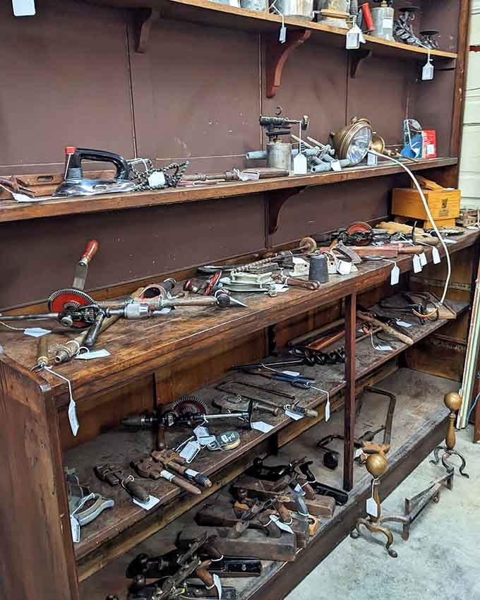 Vintage tools line weathered shelves, each one built to last generations, unlike today's disposable hardware store offerings.