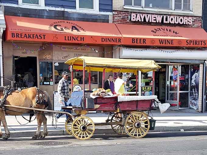 The exterior signage promising breakfast, lunch, and dinner because why limit happiness to just one meal daily?