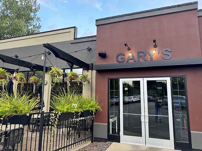 Gary's entrance welcomes you with modern touches and outdoor seating, inviting you to discover what's been here all along.